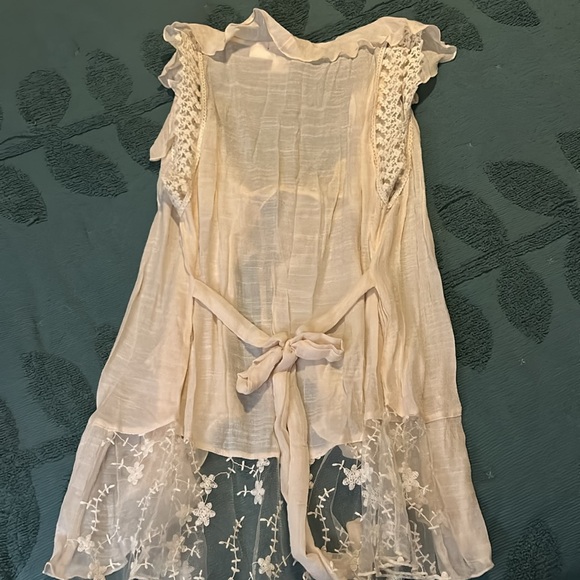 Simply Irresistible | Tops | Sleeveless Open Front Ruffles With Lace ...